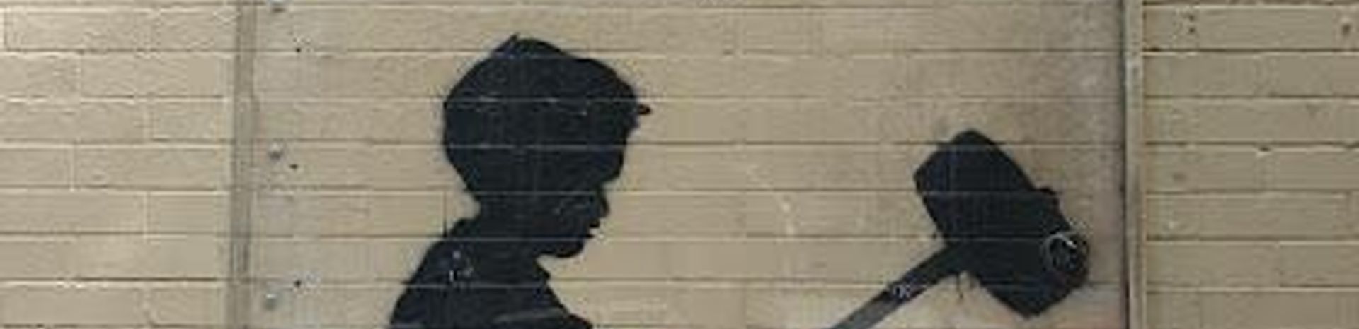 Discover the Vibrant Banksy Hammer Boy Mural